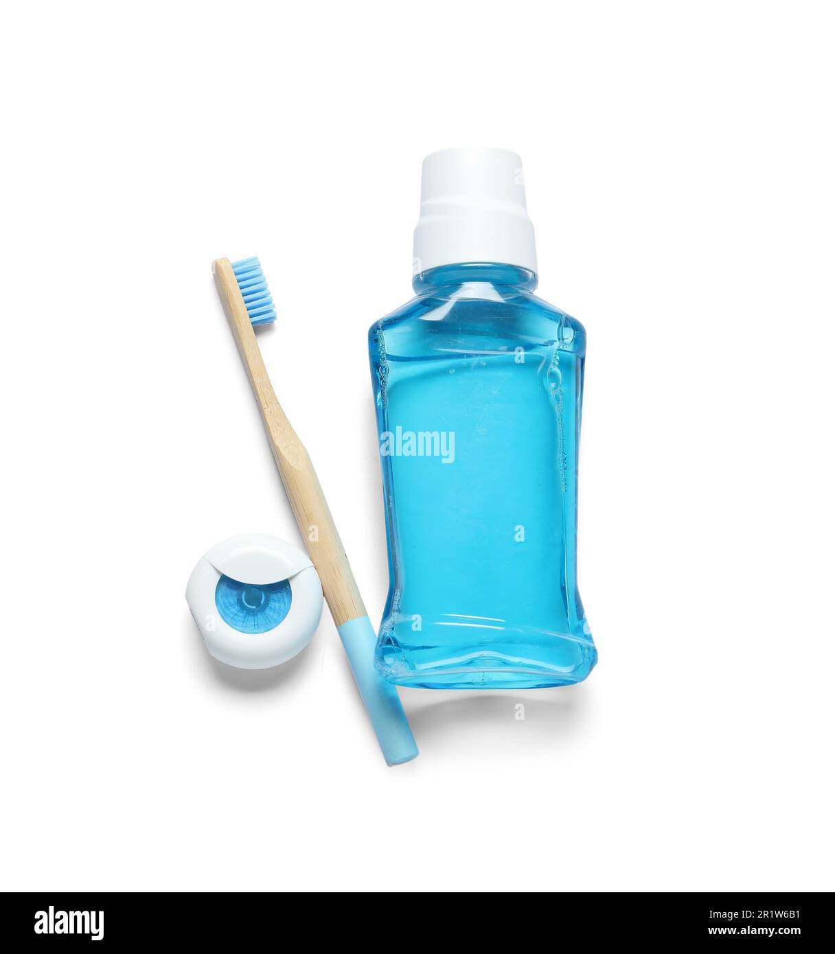 Dental floss, toothbrush and mouthwash isolated on white background ...