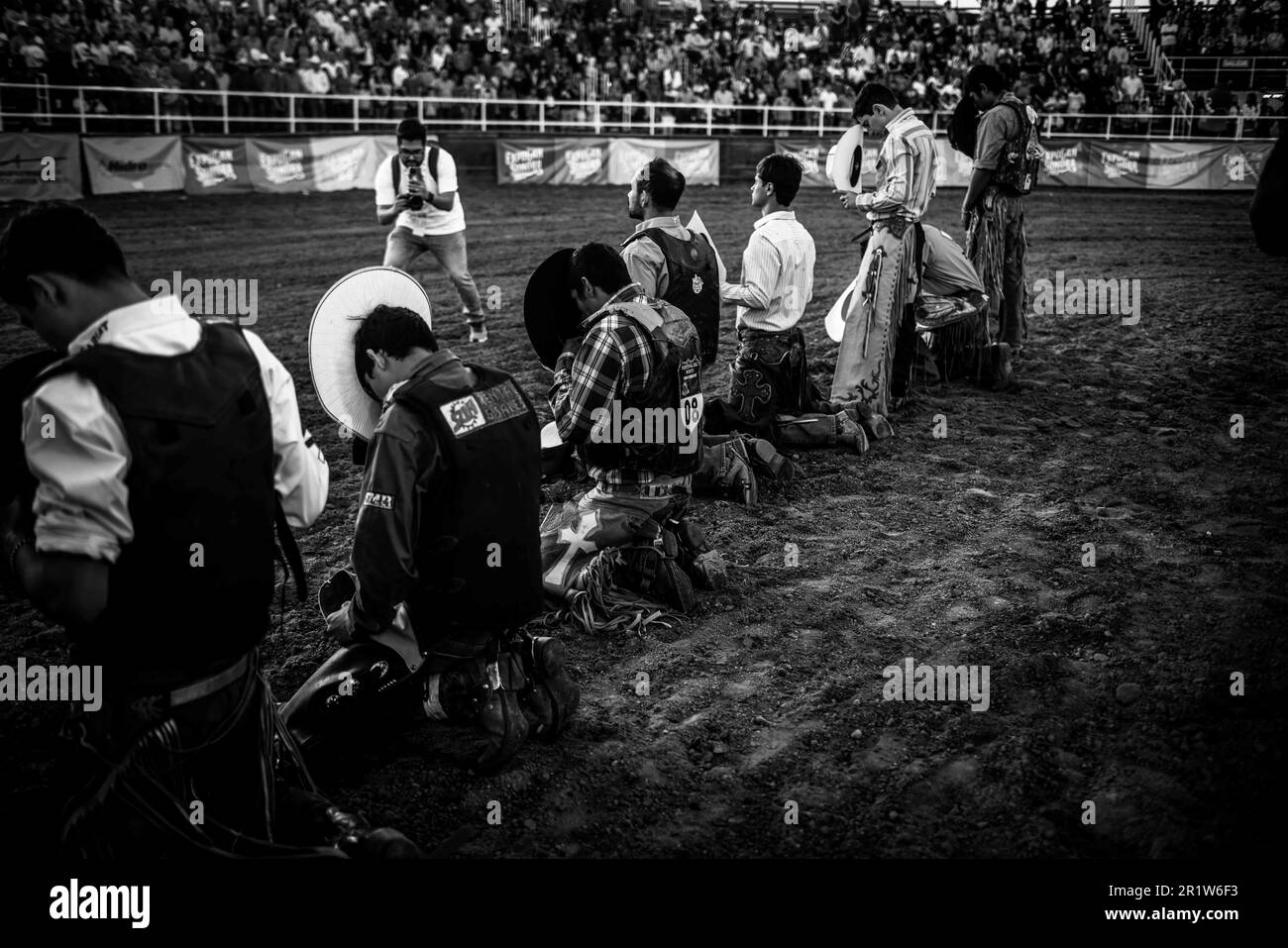 Cowboys, during the rodeo circuit at the Expo Ganadera de Sonora, on ...