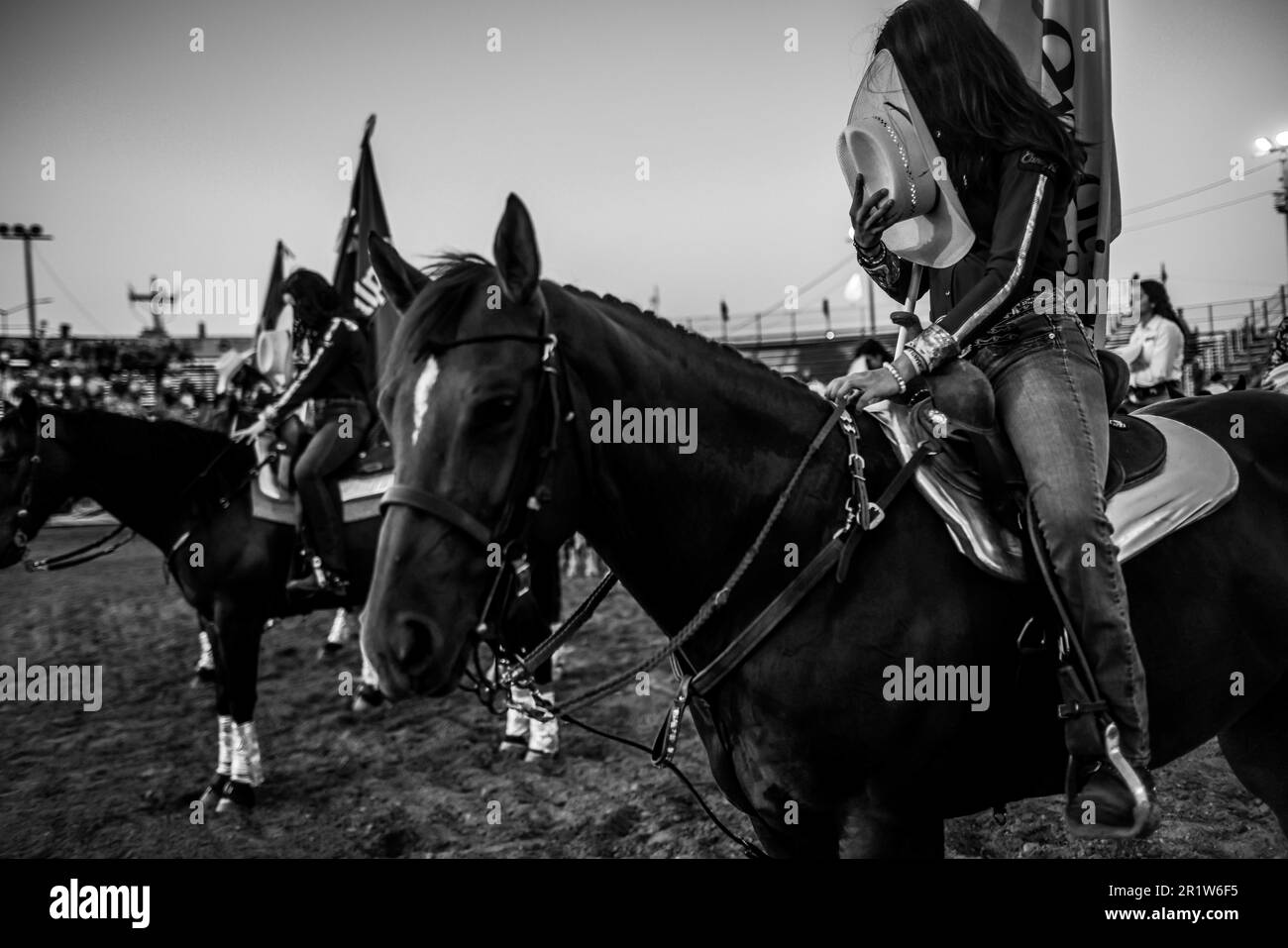 Cowboys, during the rodeo circuit at the Expo Ganadera de Sonora, on ...