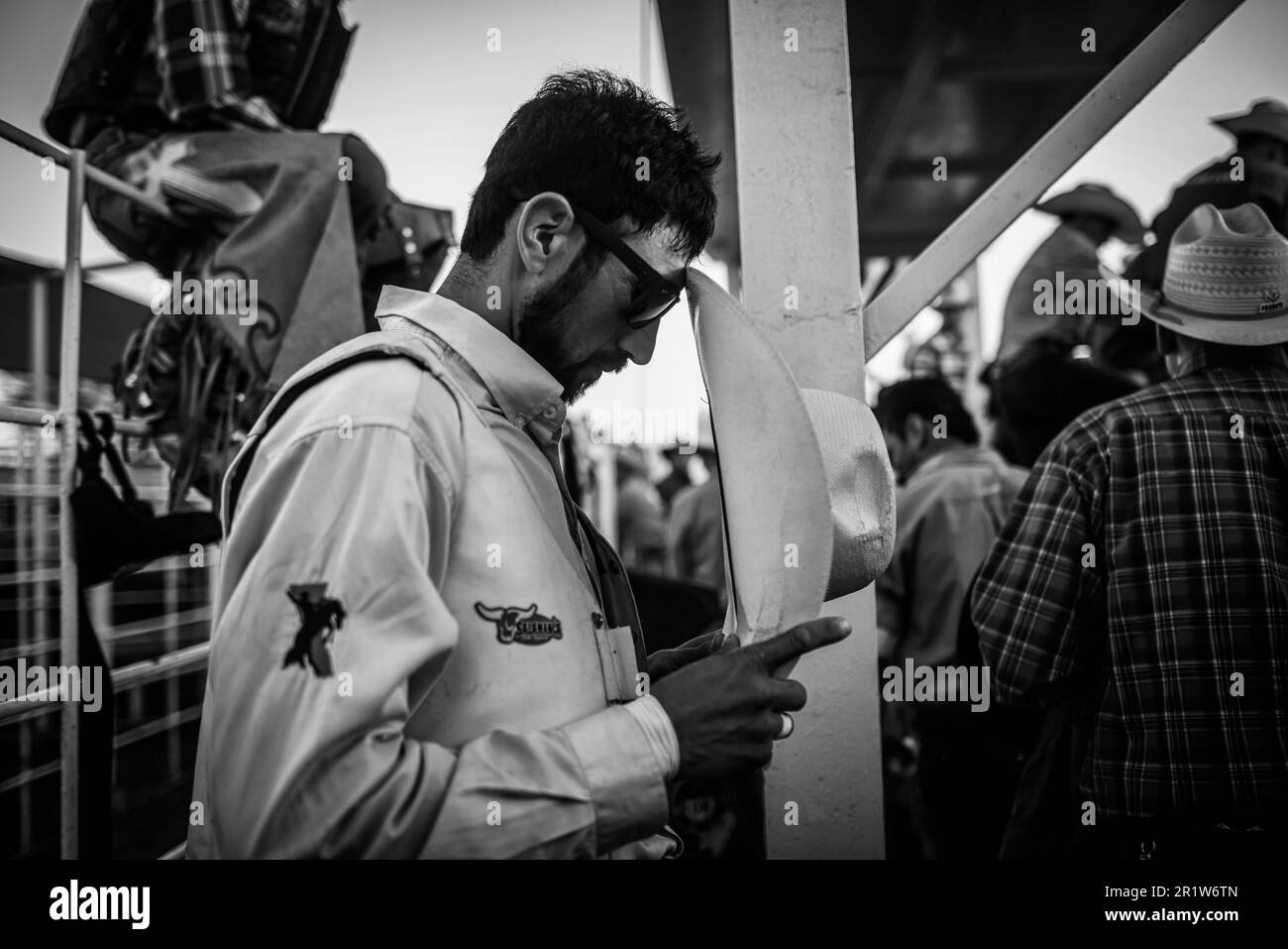 Cowboys, during the rodeo circuit at the Expo Ganadera de Sonora, on ...