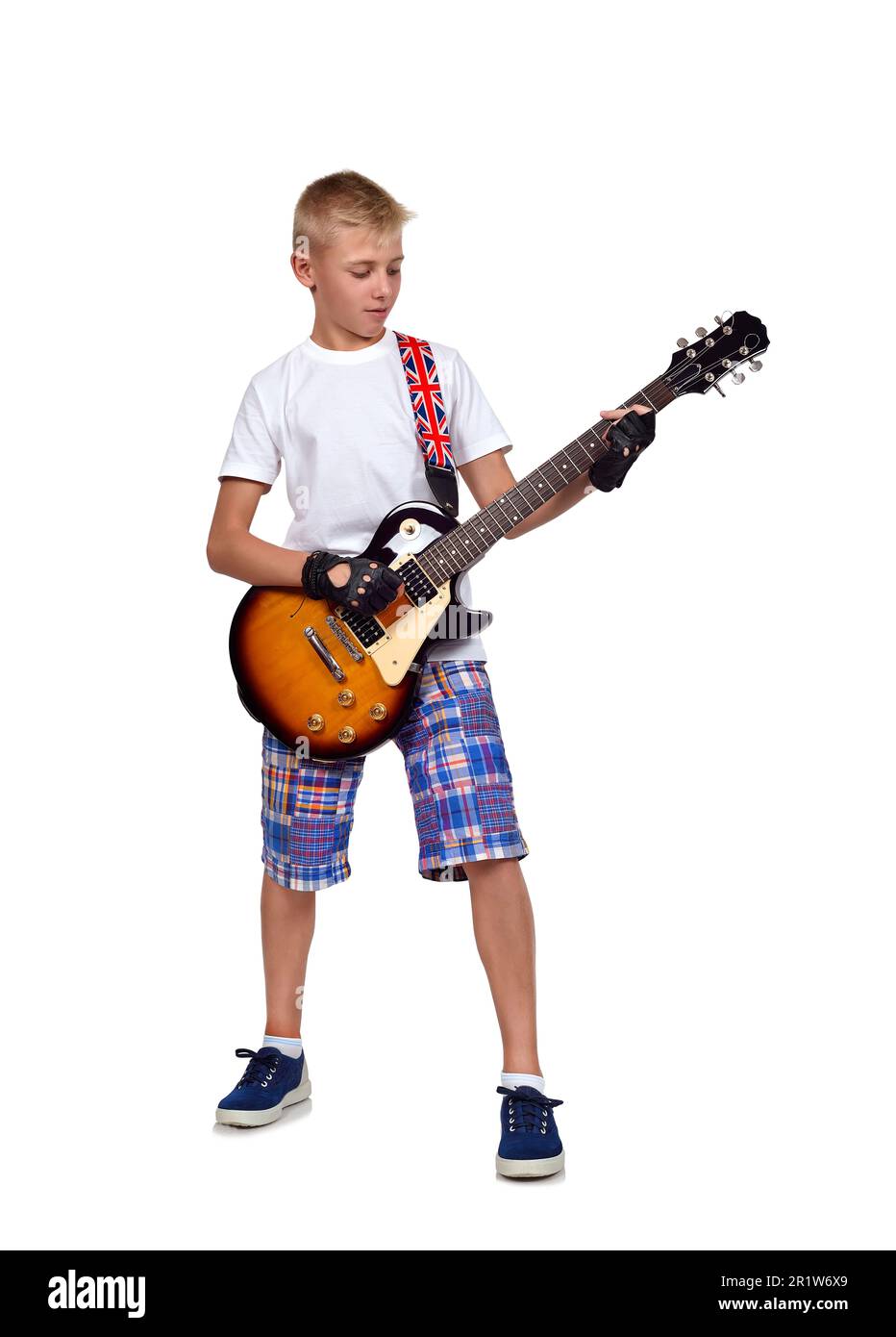 rocker boy with guitar on white background Stock Photo - Alamy