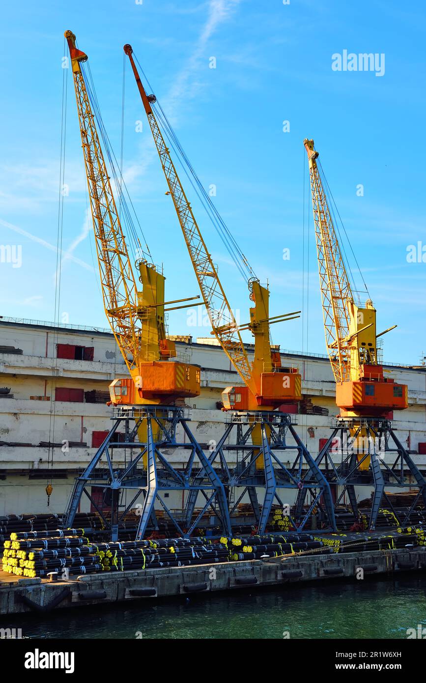 Three cargo cranes hi-res stock photography and images - Alamy