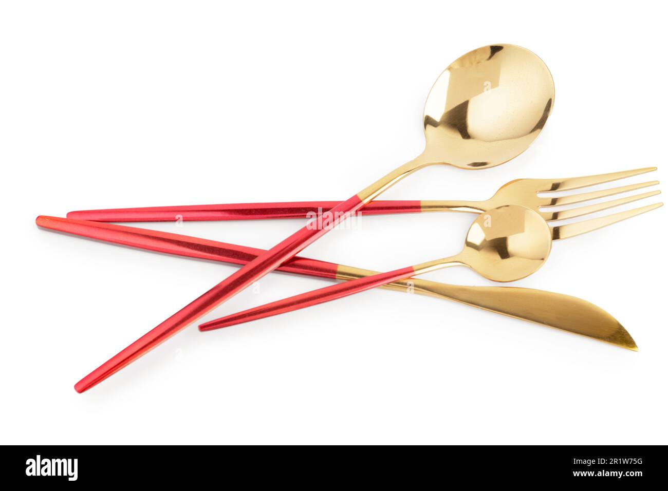 Golden set of cutlery with red handles on white background Stock Photo ...
