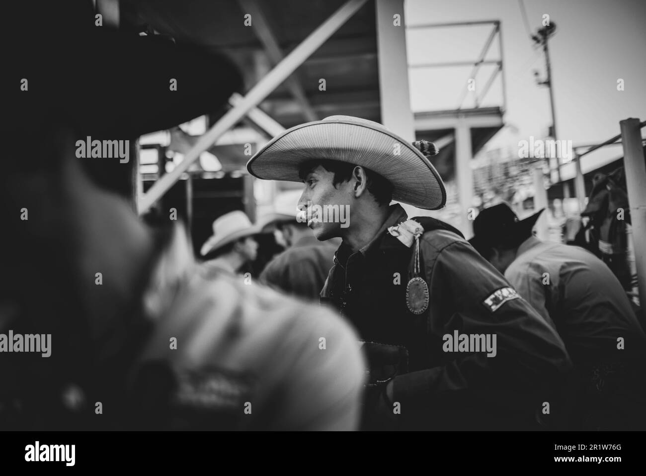 Cowboys, during the rodeo circuit at the Expo Ganadera de Sonora, on ...