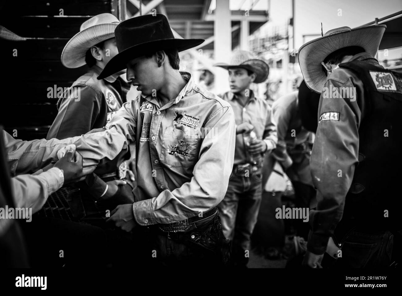 Cowboys, during the rodeo circuit at the Expo Ganadera de Sonora, on ...