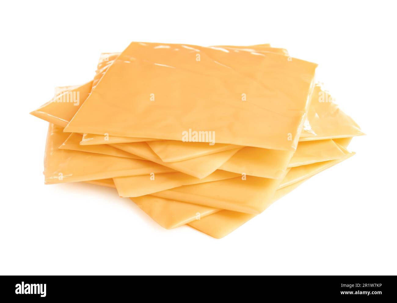 Pile of tasty processed cheese on white background Stock Photo - Alamy