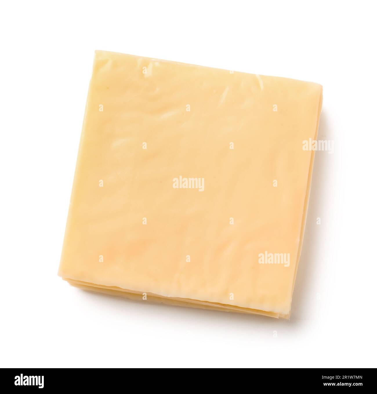 Pieces of cheddar cheese top view Cut Out Stock Images & Pictures - Alamy