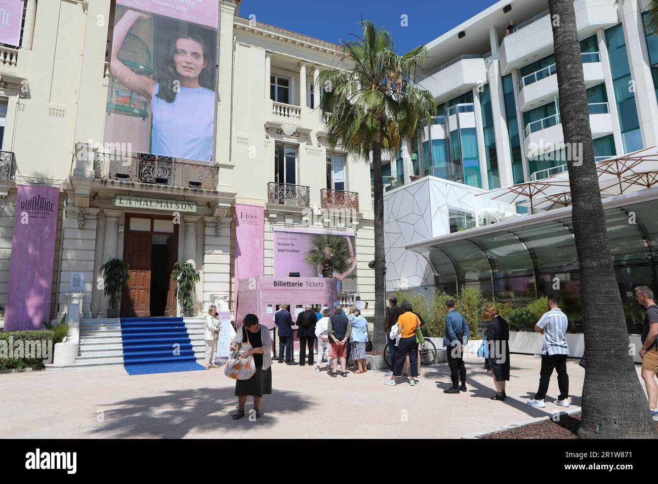 May 15, 2023, Cannes, CÃ´te d'Azur, France: Festival goers queue at the ticket counter to grab a ...