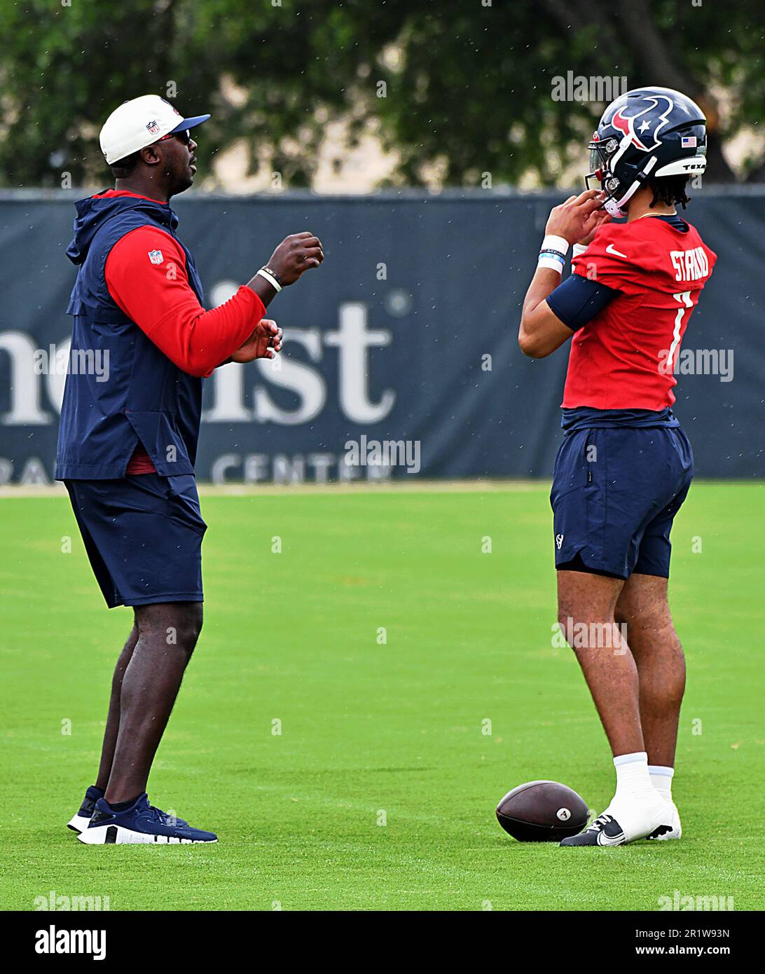 Houston Texans quarterback CJ Stroud (7) speaks with Head Coach DeMeco ...