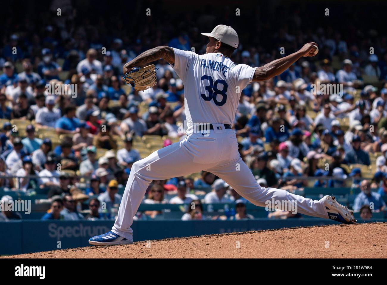 Los Angeles Dodgers relief pitcher Yency Almonte (38) throws during a ...