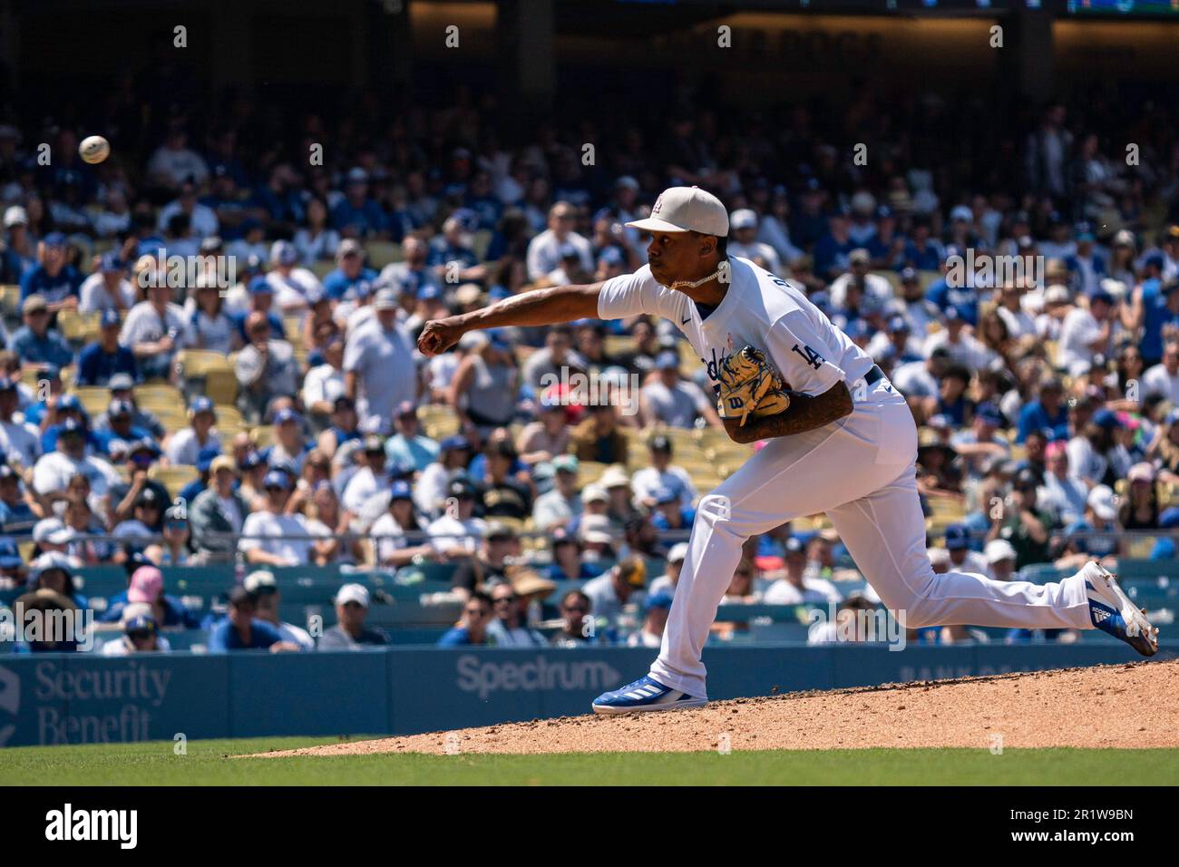 Los Angeles Dodgers relief pitcher Yency Almonte (38) throws during a ...