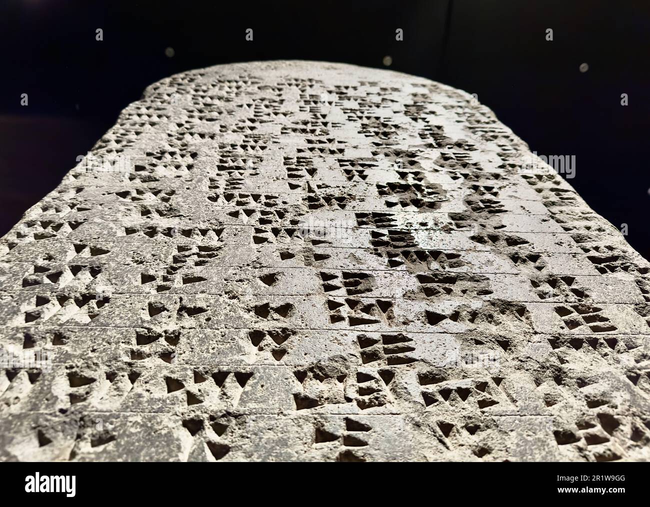 An ancient Ghanlija inscription is seen carved into a stone monument in ...