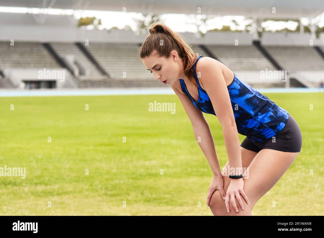 She left it all on the track. an attractive young female athlete down ...