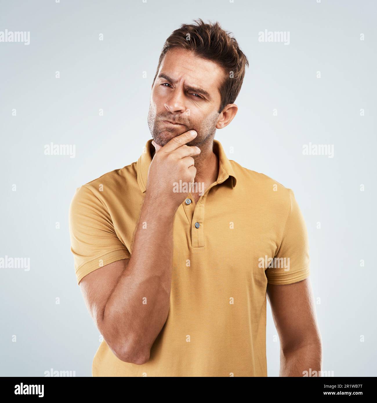 I wonder how and I wonder why. Portrait of a carefree young man with a ...