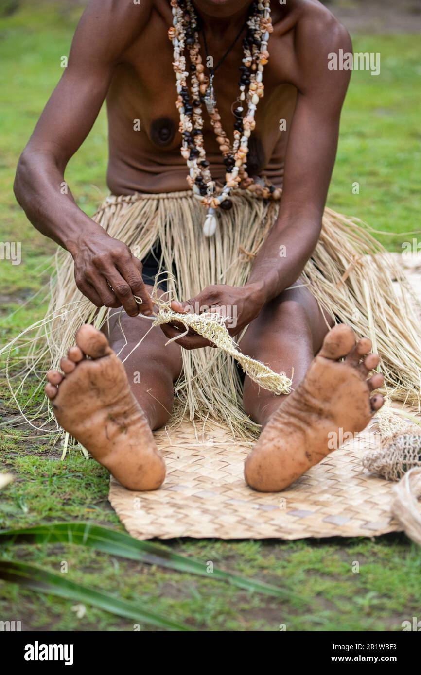 Polynesian woman weaving hi-res stock photography and images - Alamy