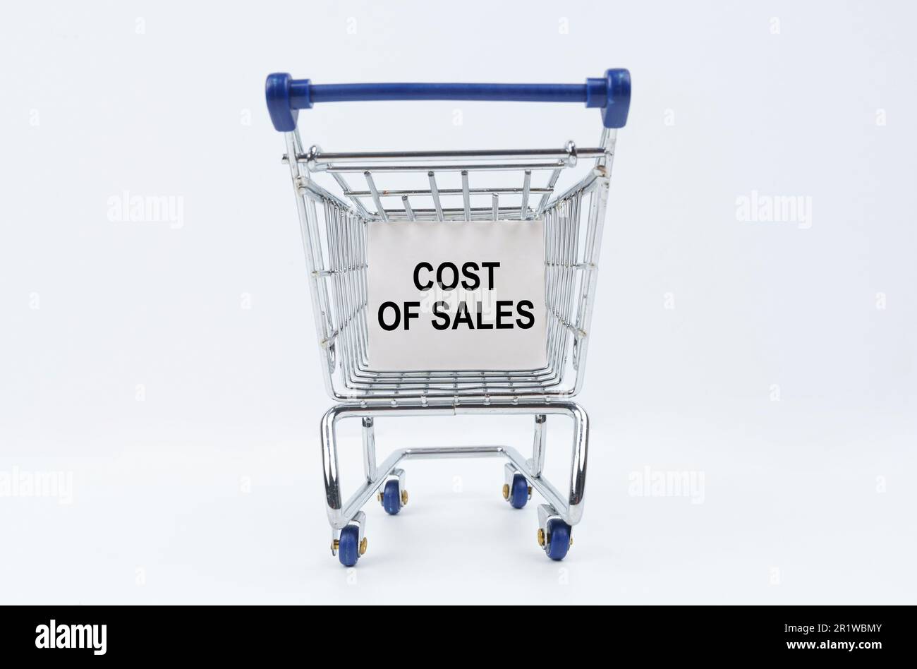 Business concept. On a white background is a shopping cart with a sign ...
