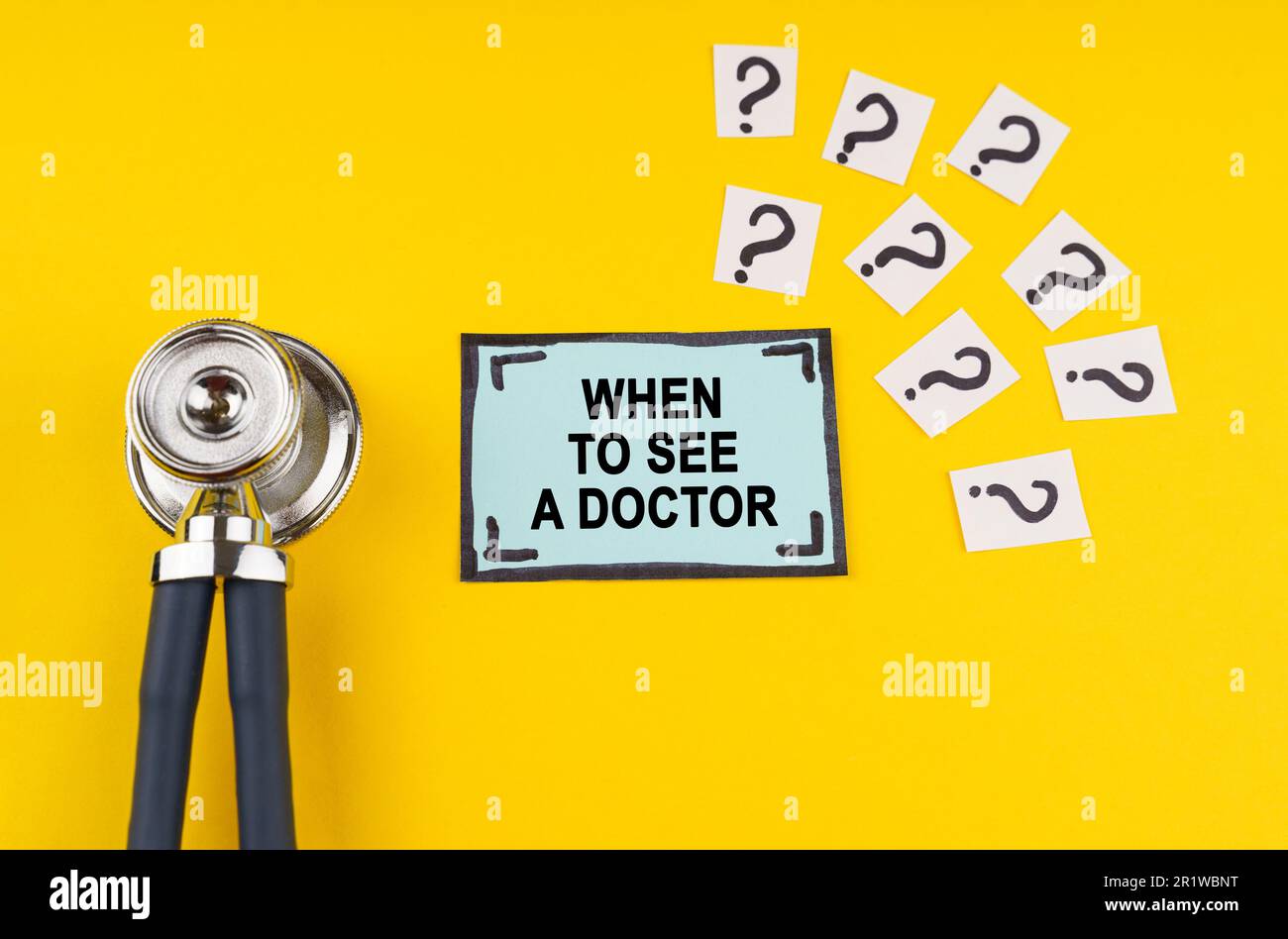 Medical concept. Question. On a yellow background a stethoscope ...