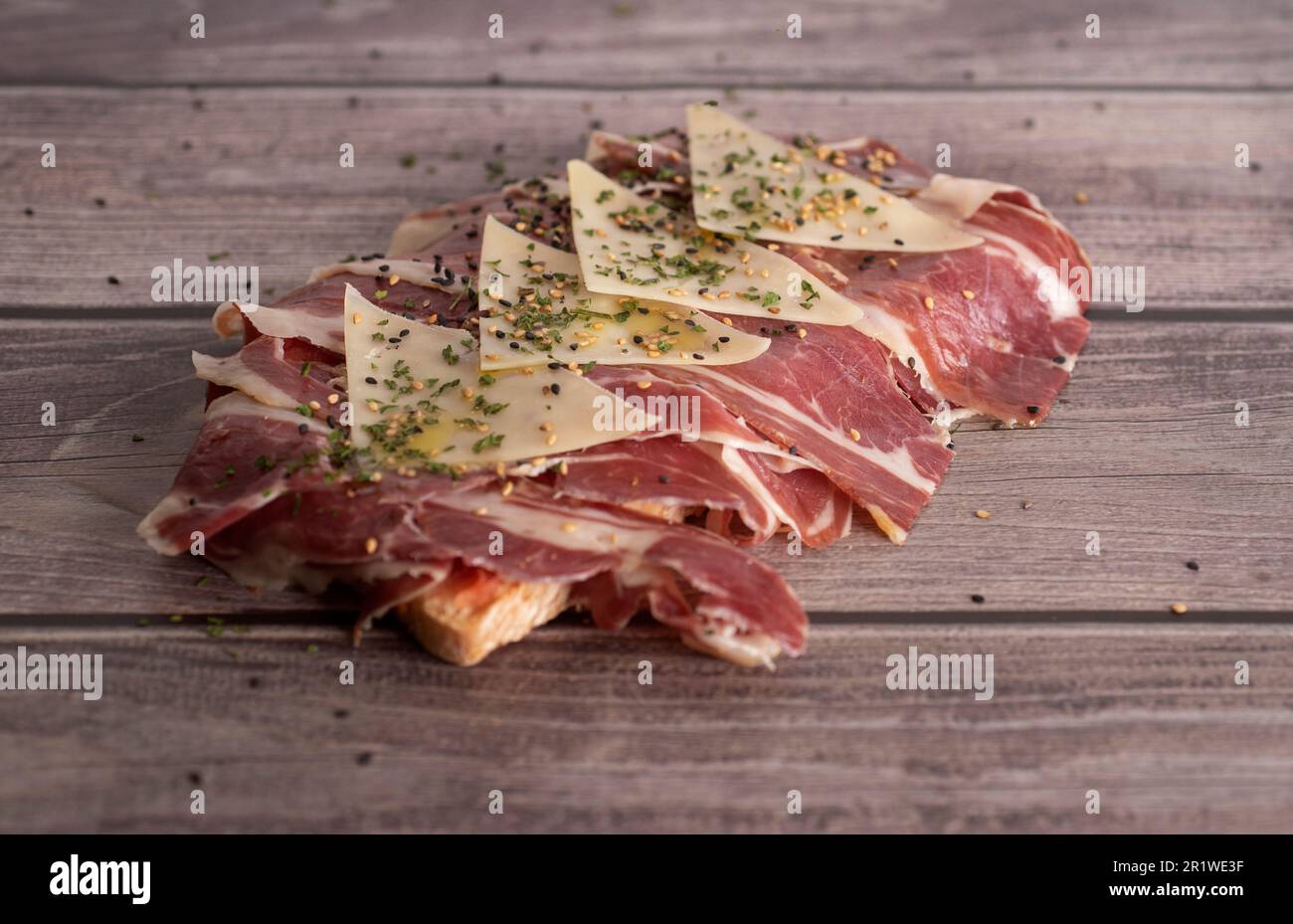 tomato toast, serrano ham and cheese Stock Photo - Alamy