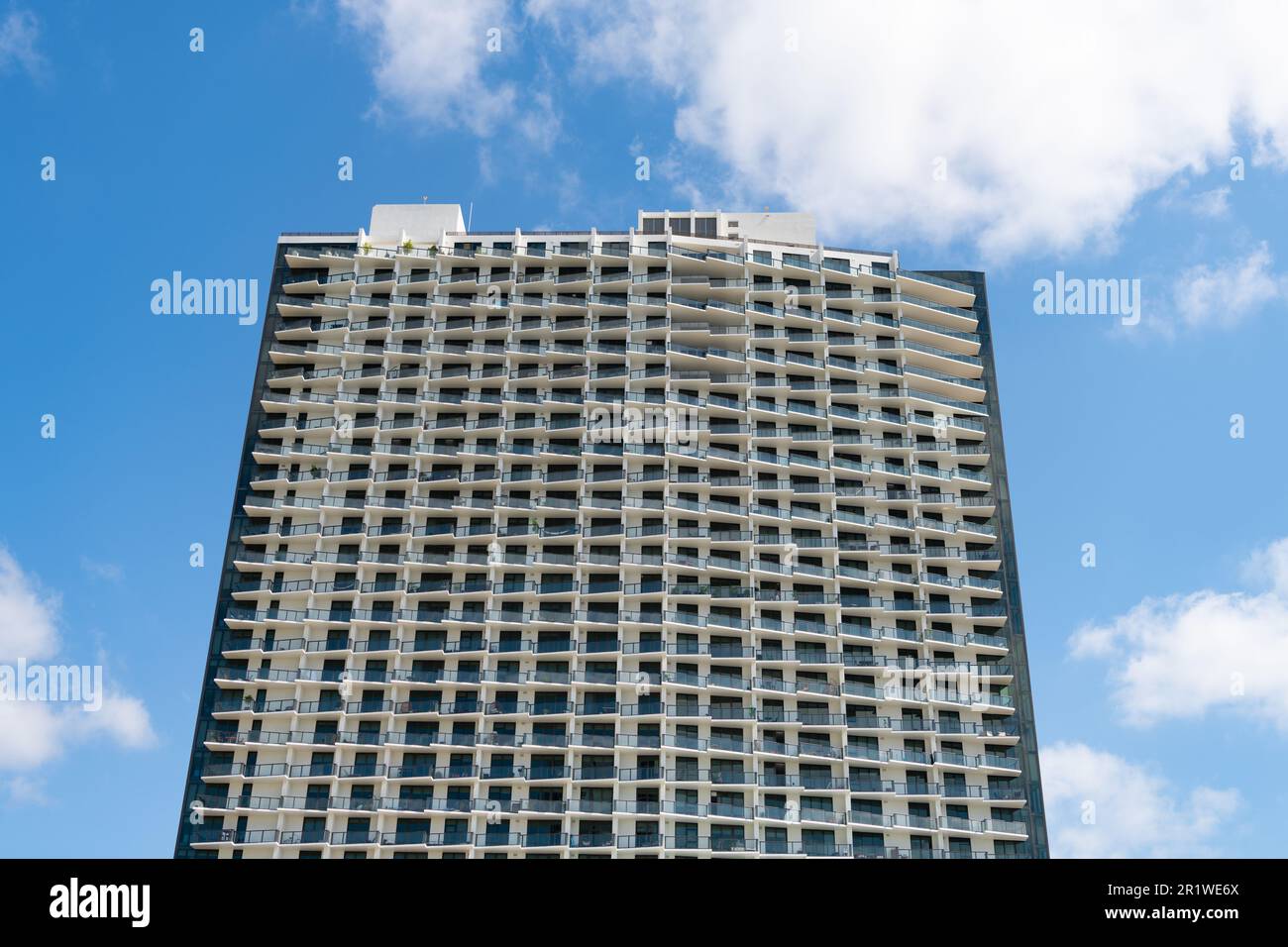 one high skyscraper architectural building on blue sky. skyscraper ...