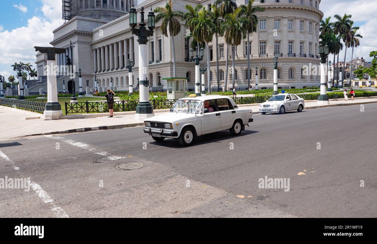 Havana, Cuba - May 02, 2019: National Capitol Building with moskvitch ...