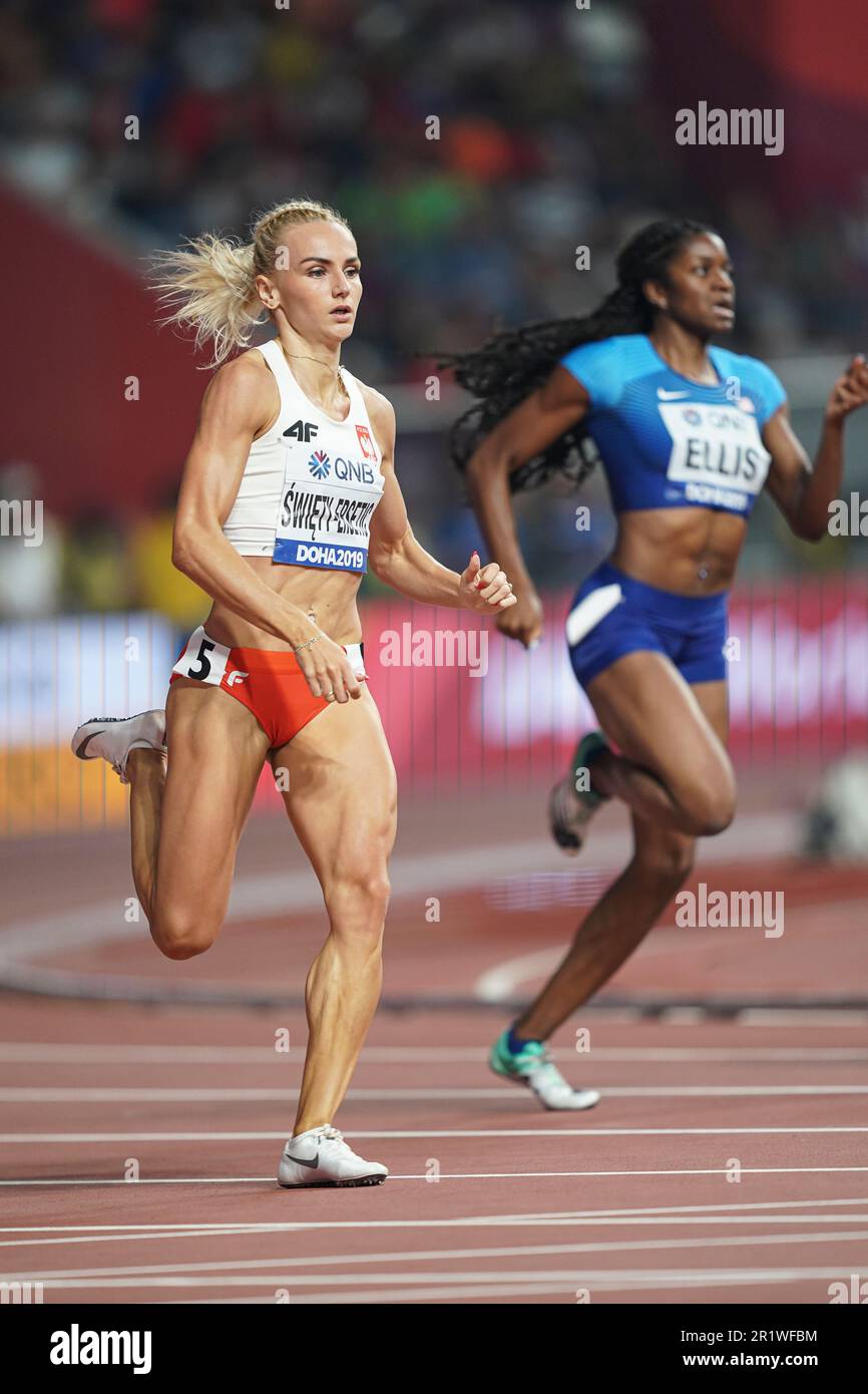 Justyna Święty-Ersetic running the 400m at the 2019 World Athletics ...