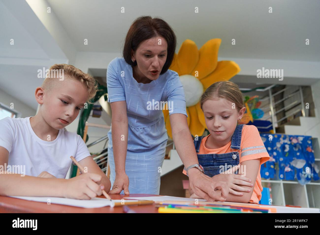 Creative kids during an art class in a daycare center or elementary ...