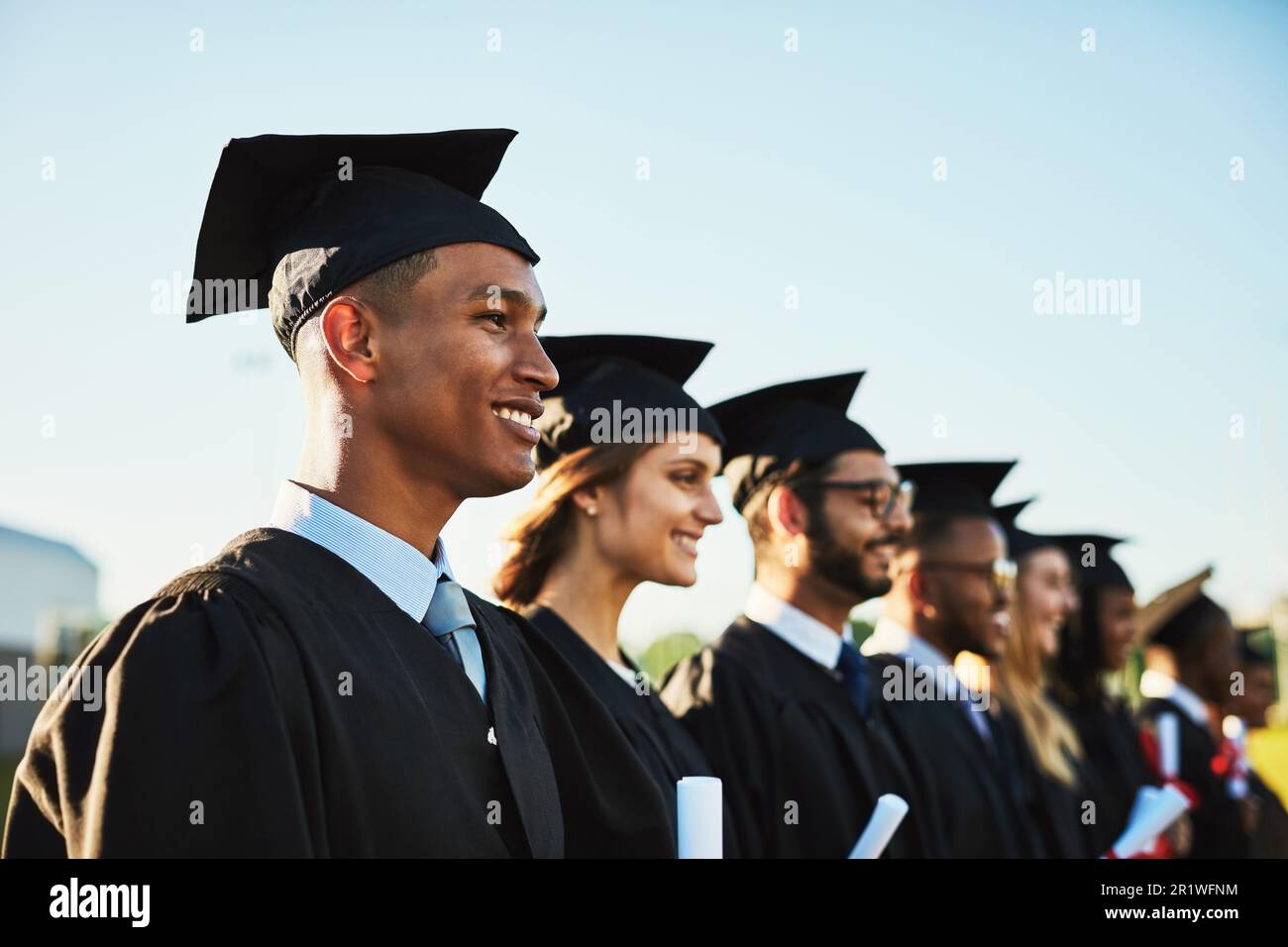All that studying is worth it in the end. a smiling university student ...