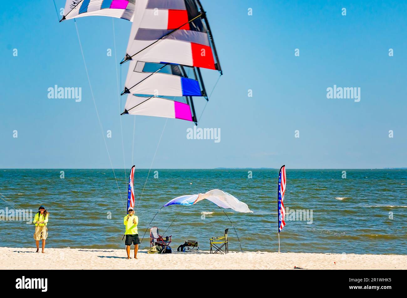 People fly quad line stunt kites over the beach, May 13, 2023, in Long ...