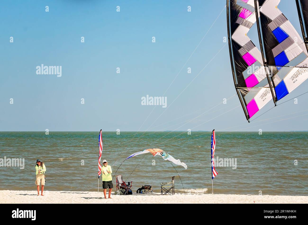 People fly quad line stunt kites over the beach, May 13, 2023, in Long ...