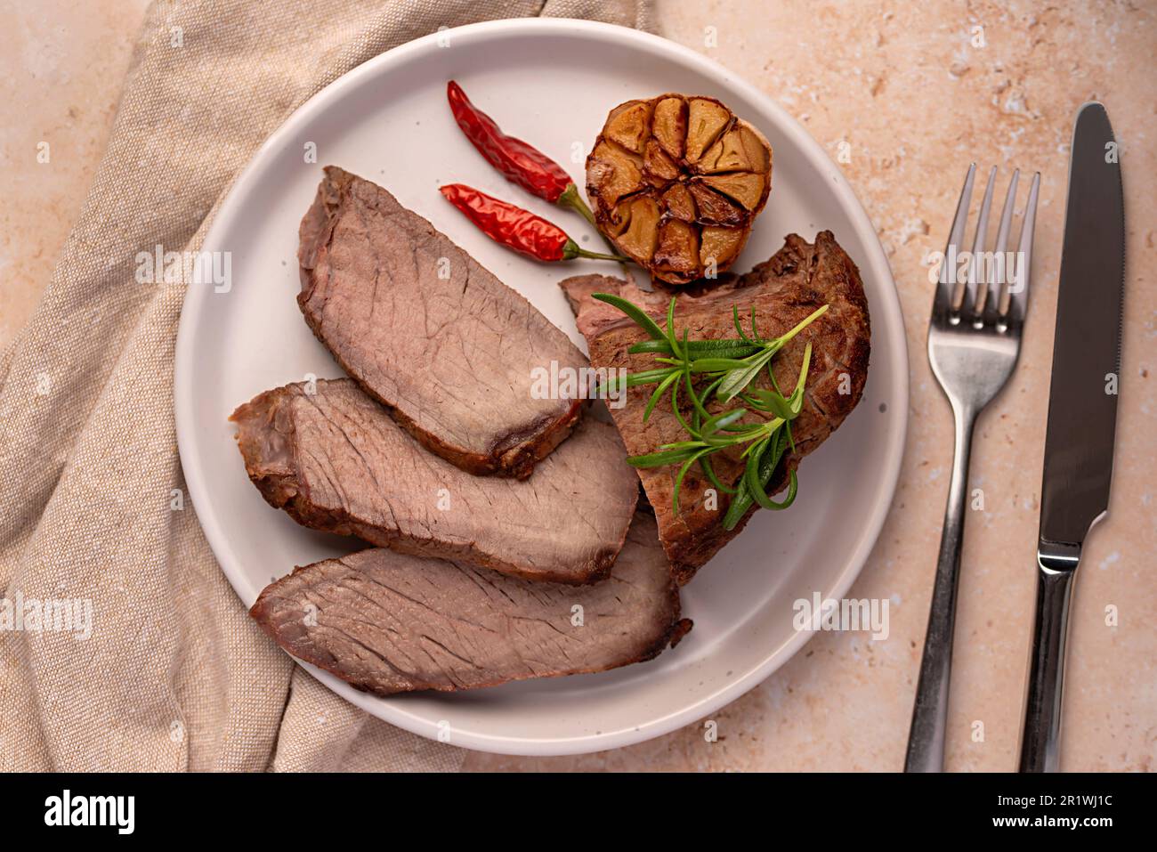 Food photography of roasted beef, joint, fillet, rosemary, garlic ...