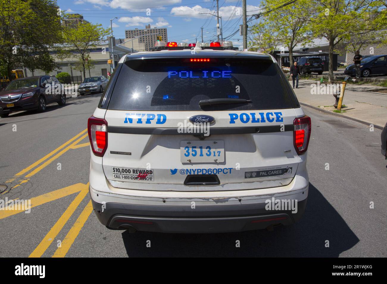 Children of various ages march along Mermaid Avenue in the Community ...