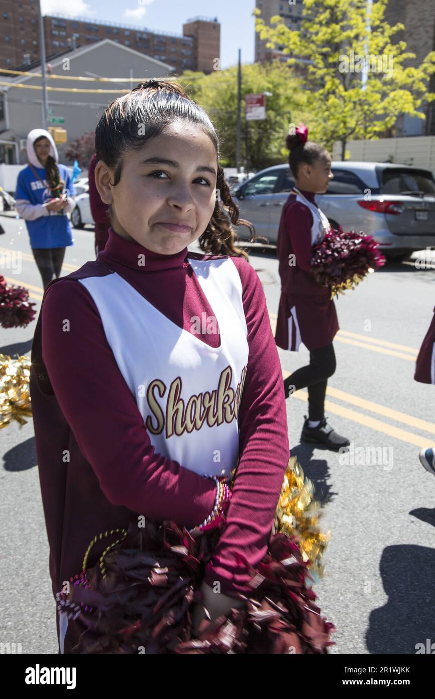 Children of various ages march along Mermaid Avenue in the Community ...