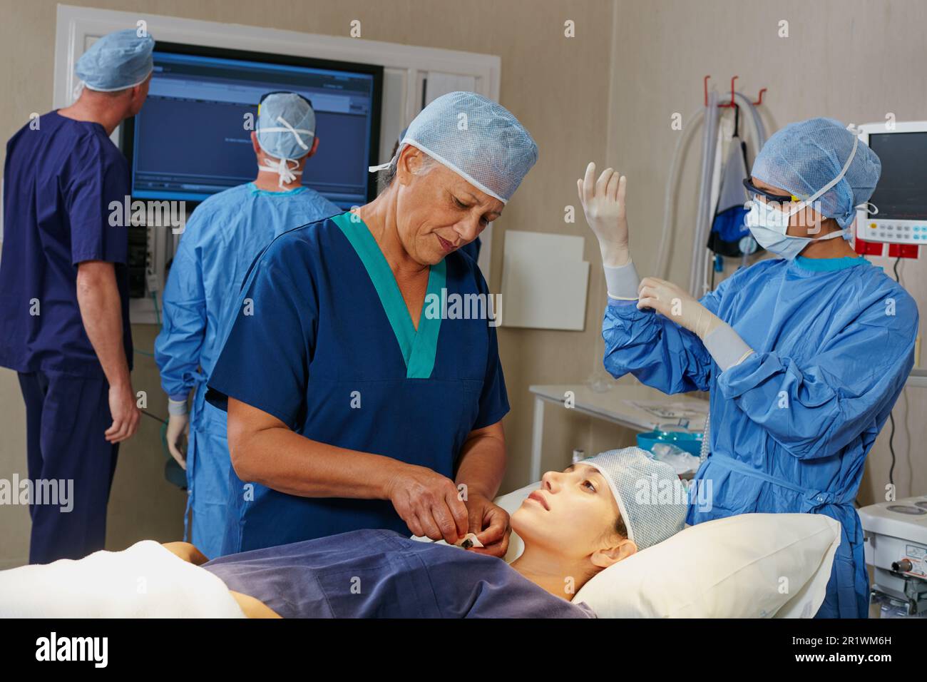 Happy patients female nurse preparing hi-res stock photography and ...