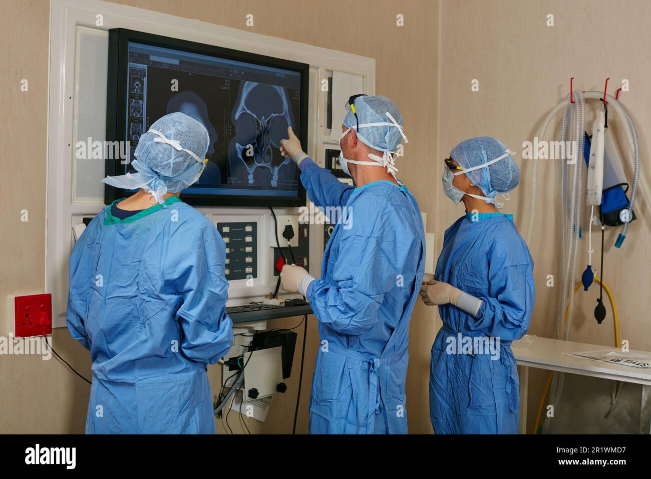 Confirming the course of action for the surgical procedure. a team of ...