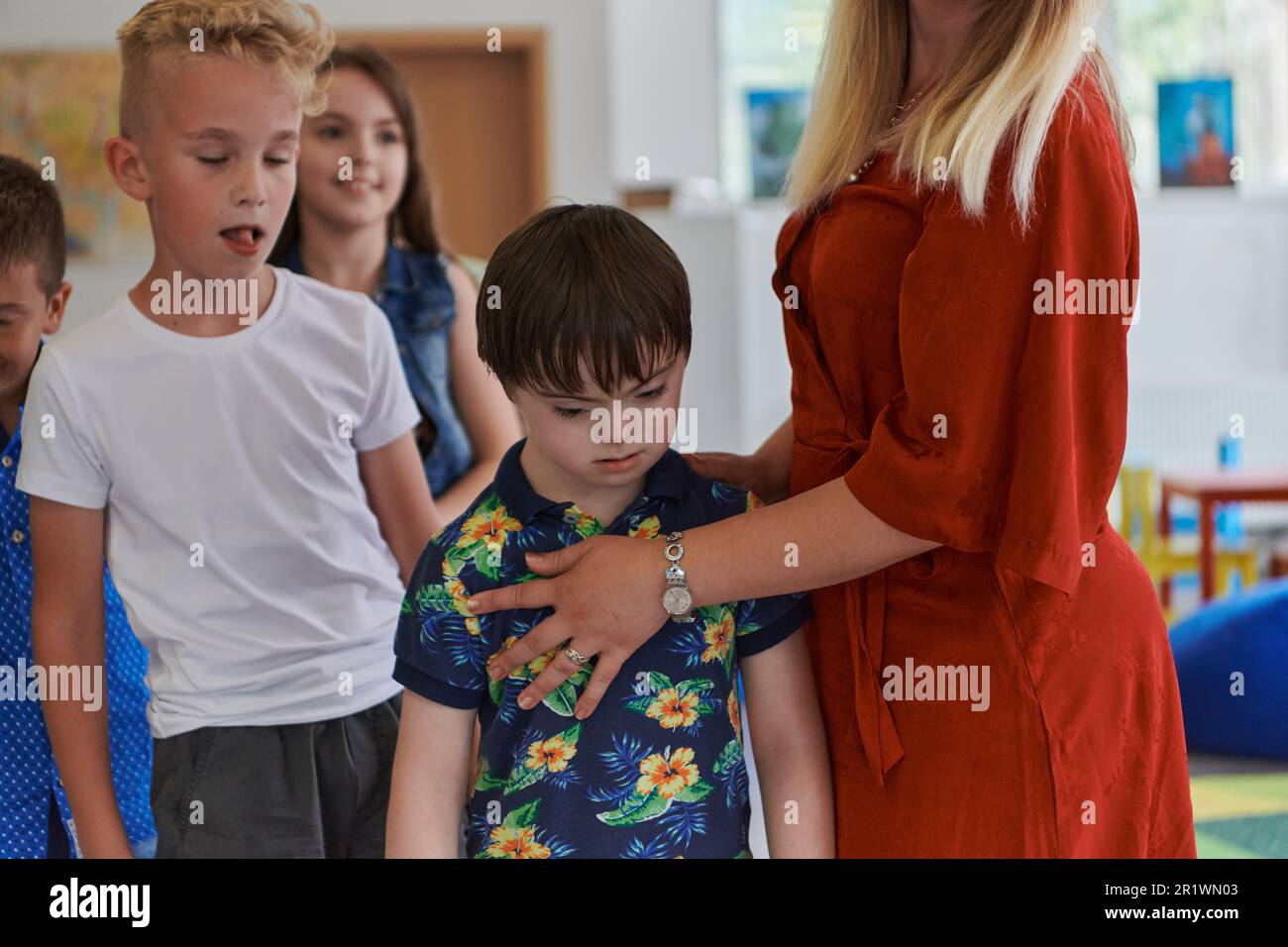 Preschool children wait in line for new and interesting games ...