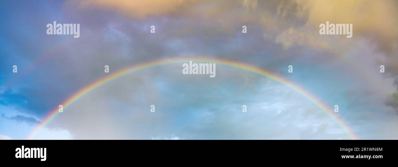 Light rainbow rising stormy hi-res stock photography and images - Alamy