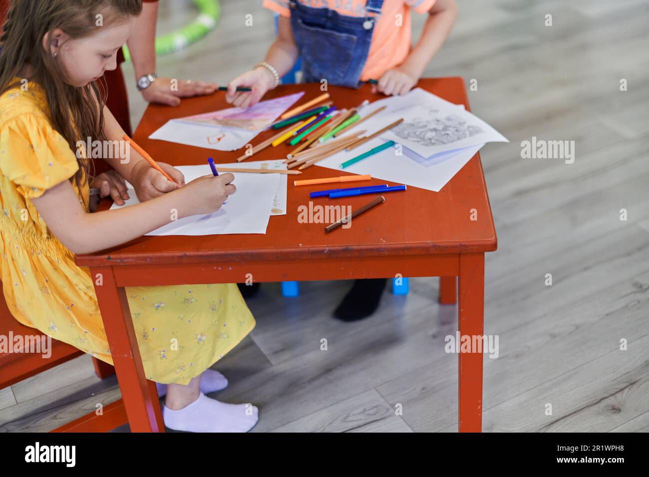 Creative kids during an art class in a daycare center or elementary ...