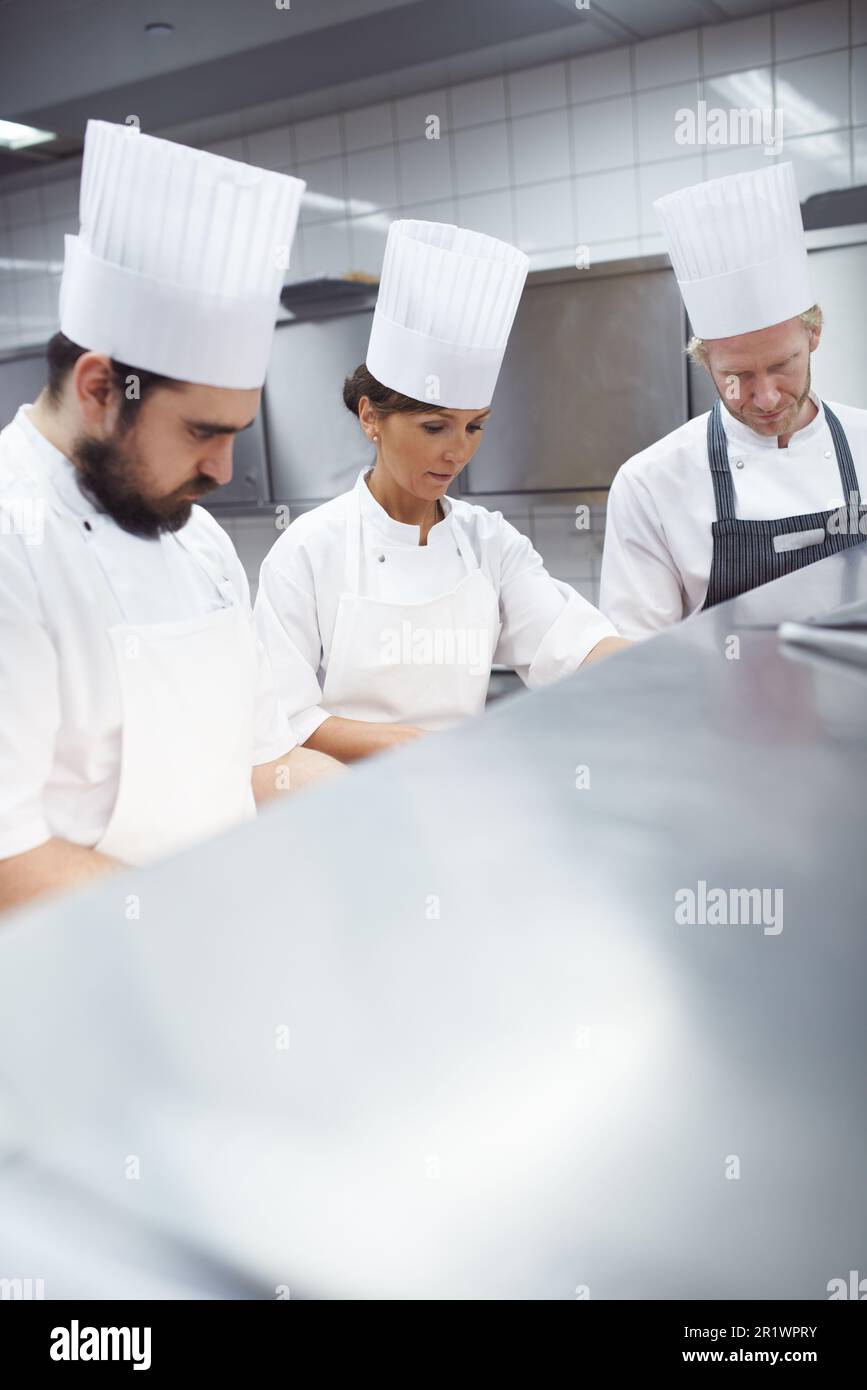 Many hands make light work. the inner working of a professional kitchen ...