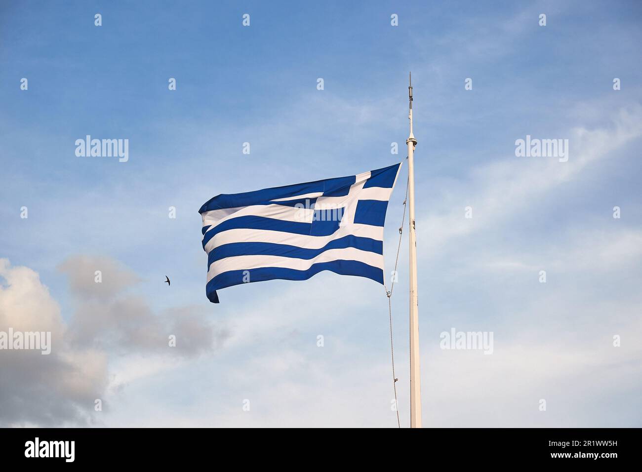 Flag of Greece on a pole Stock Photo - Alamy