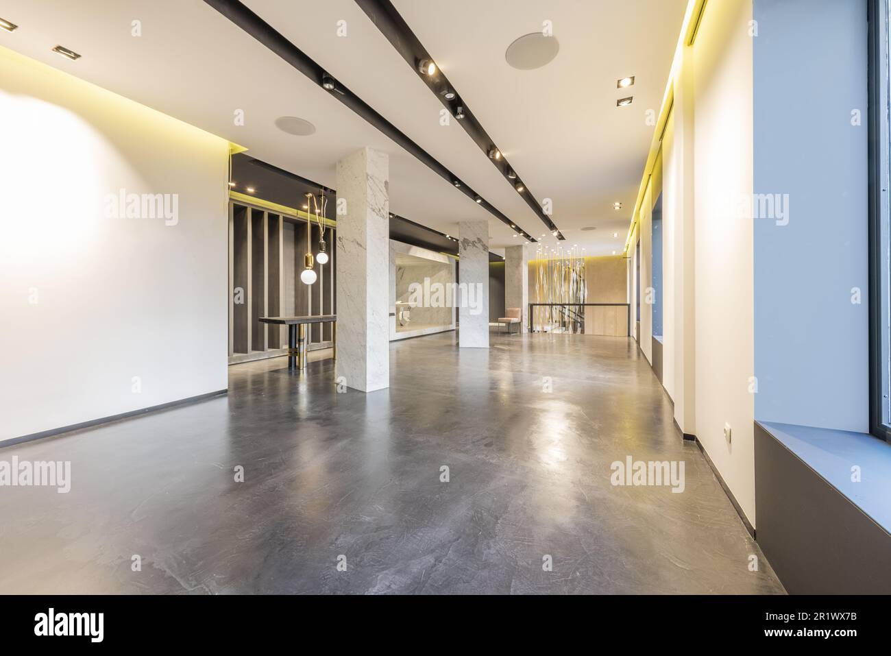 An empty commercial premises with polished concrete floors and ...
