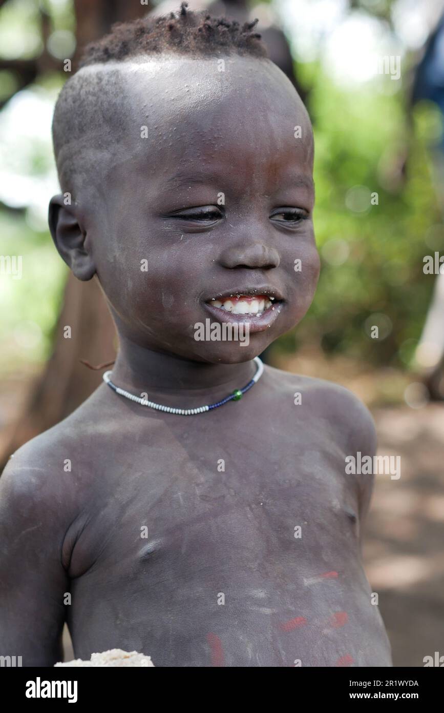 Omo Valley, Ethiopa â€“ 11.17.2022: Young boy from the Mursi tribe ...