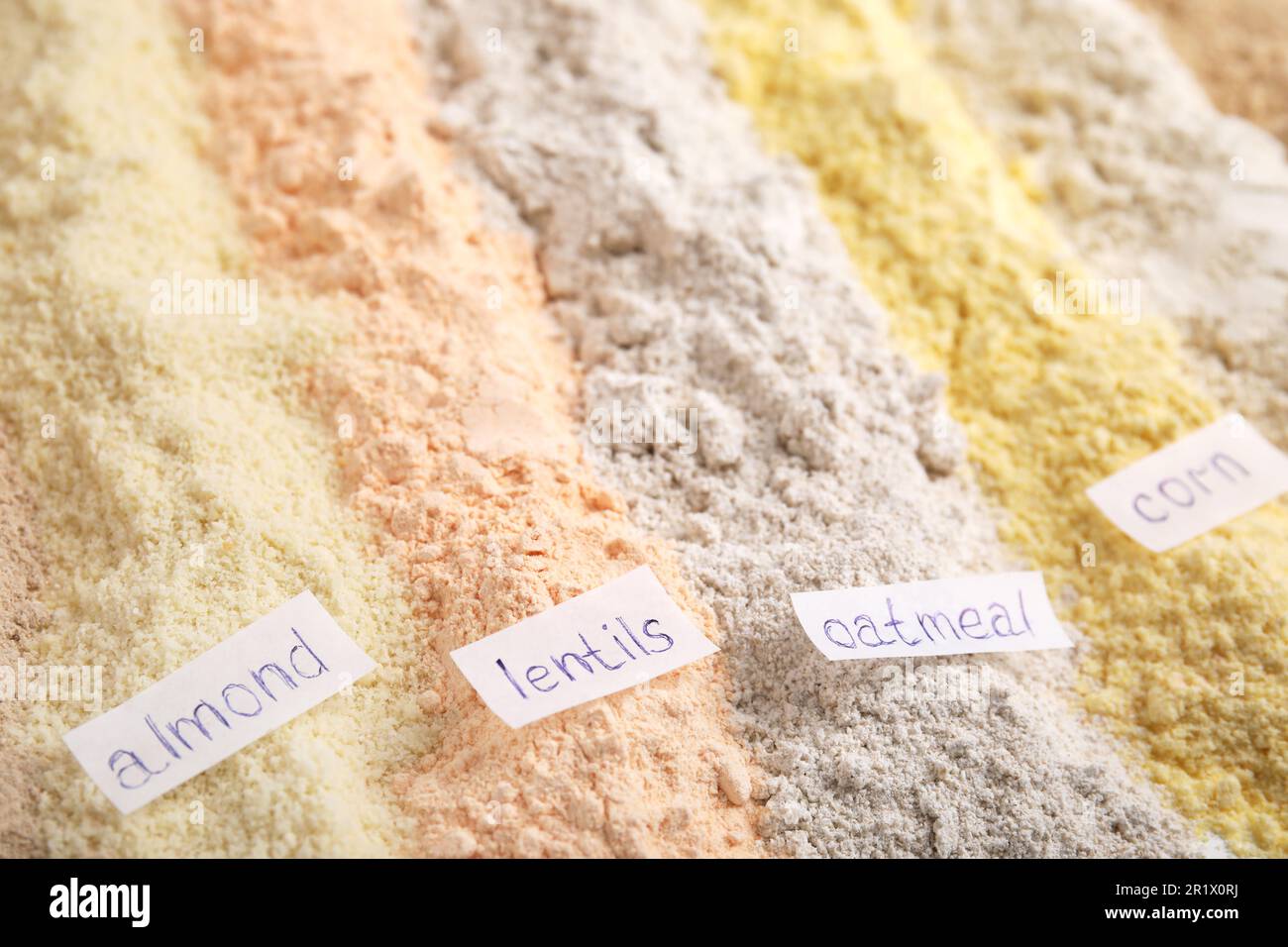 Different types of flours as background, closeup Stock Photo - Alamy