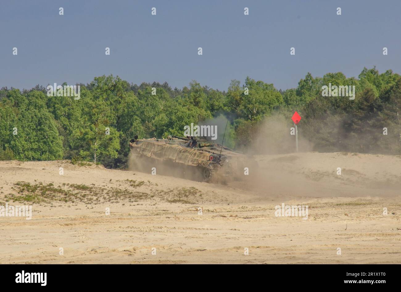Polish soldiers assigned to the 19th Mechanized Brigade maneuver a PT ...