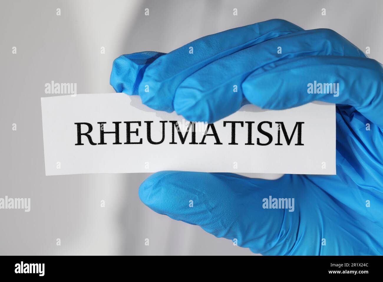 Doctor holding in hand arthritis hi-res stock photography and images ...