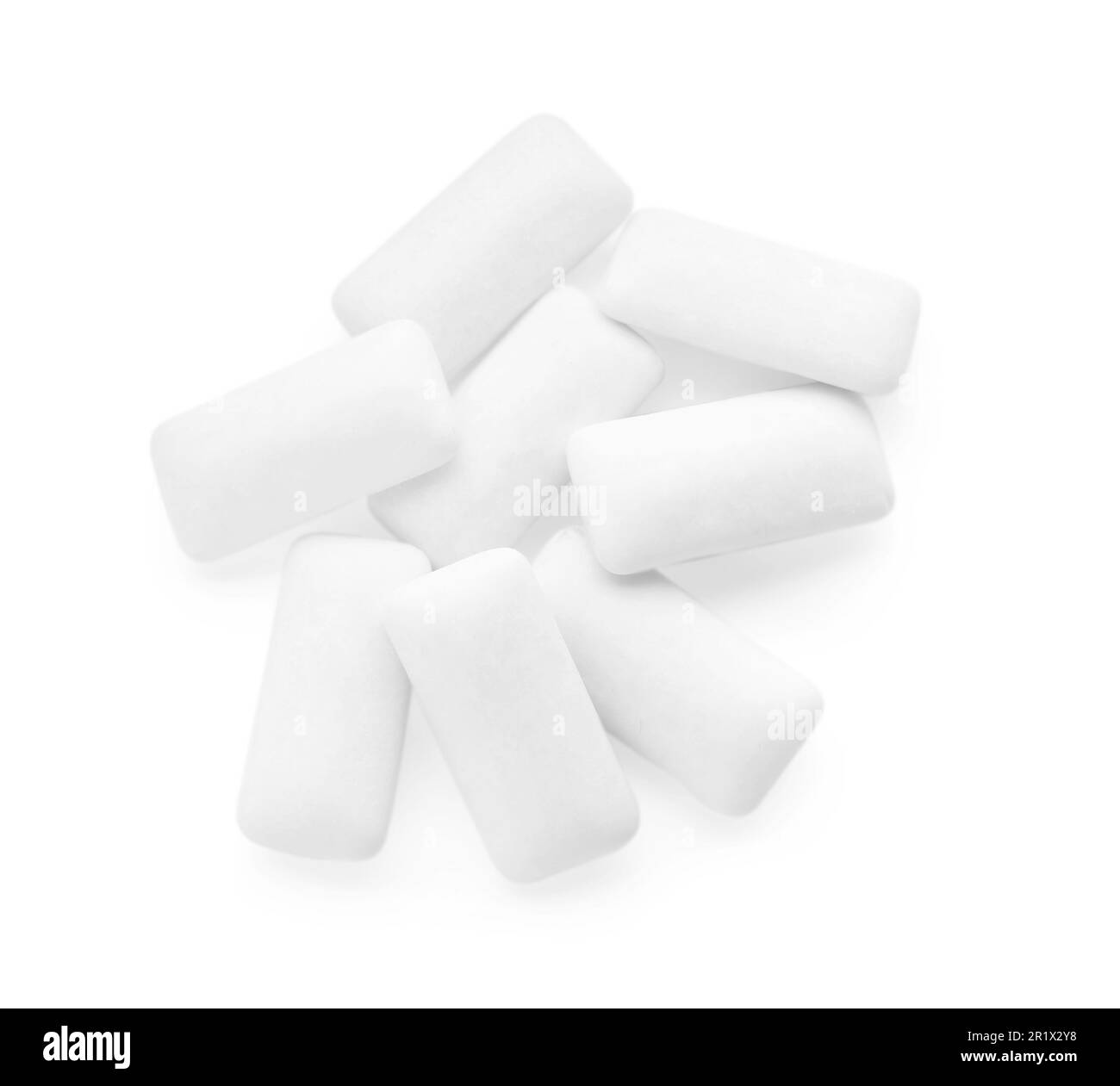 Heap of chewing gum pieces on white background, top view Stock Photo ...