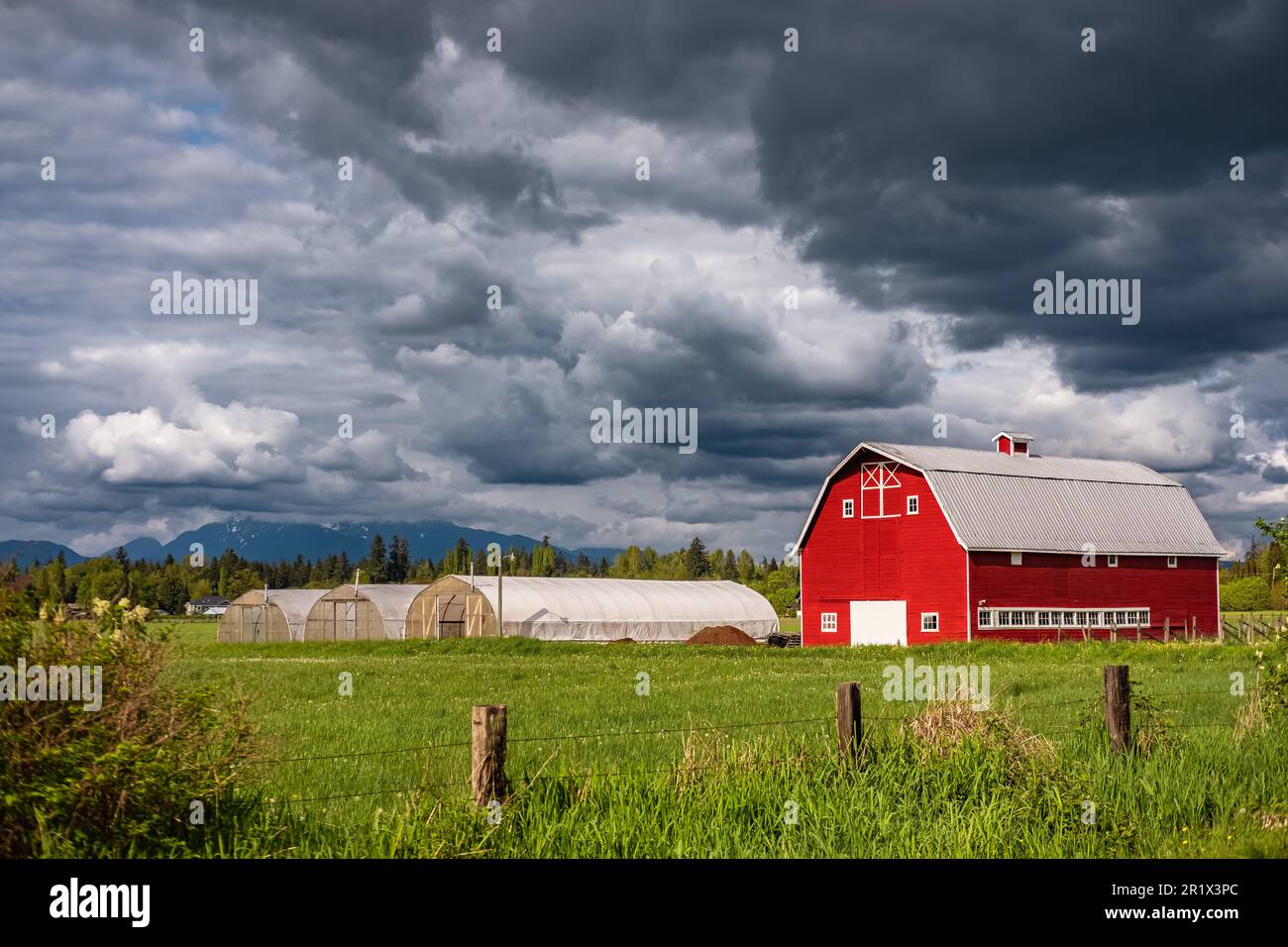 Agriculture Landscape With Old Red Barn in overcast day. Countryside ...