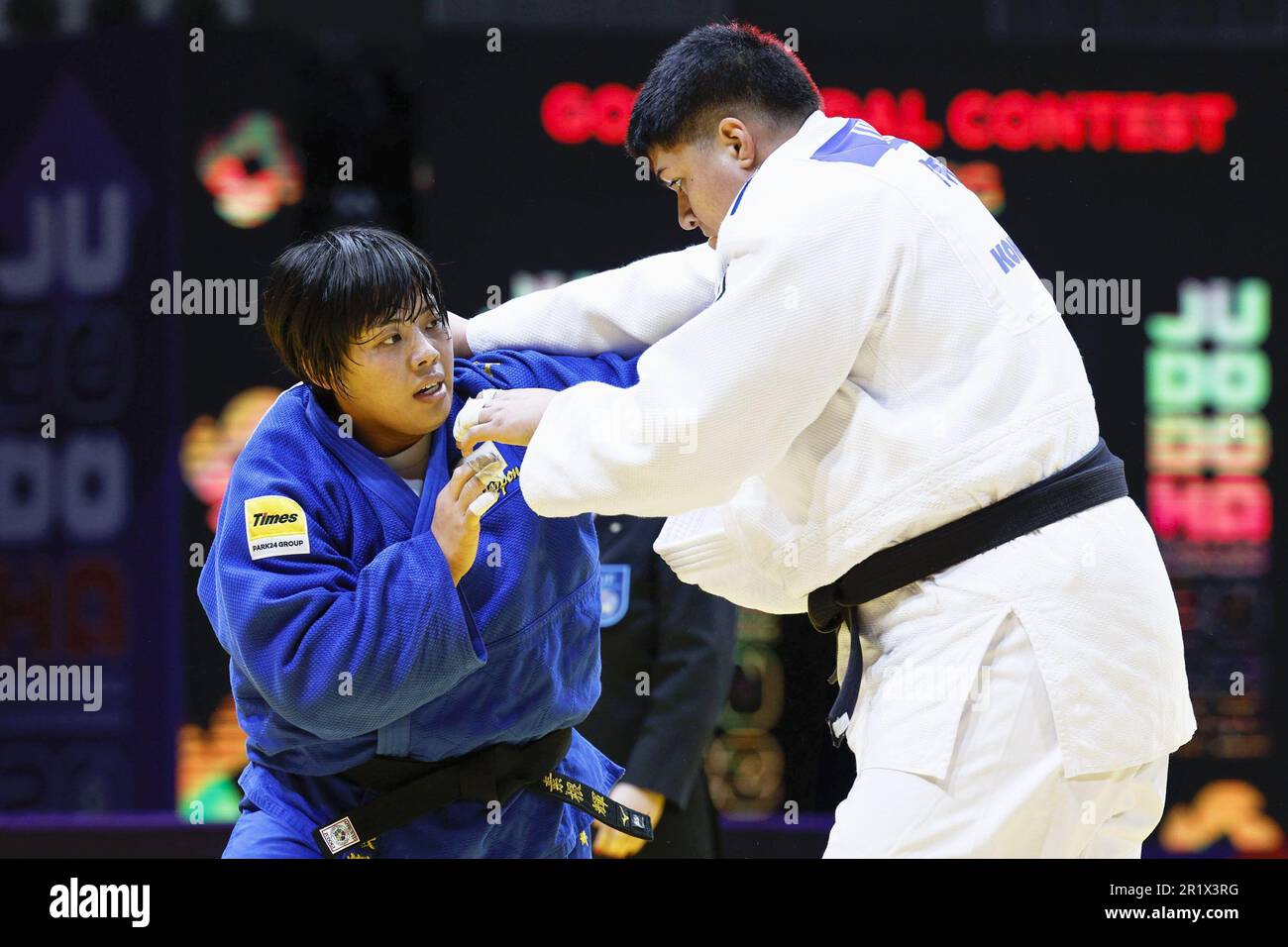 Japan's Akira Sone (blue) takes on Julia Tolofua of France in the women's over-78-kilogram final ...