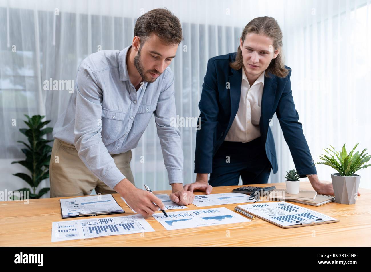 Analyst team in office analyzing financial data analysis for marketing ...