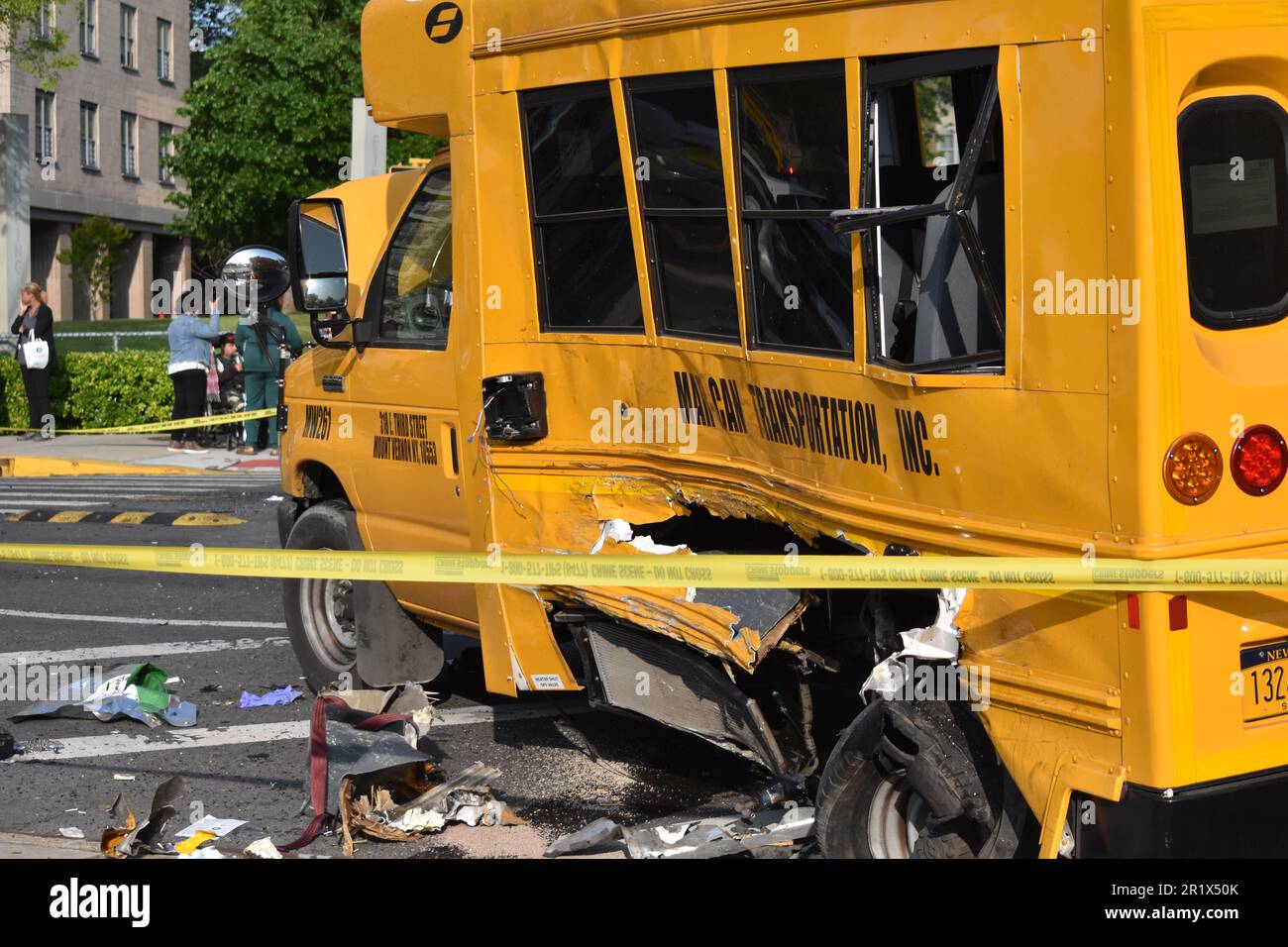 The Bronx, New York, USA. 15th May, 2023. School bus involved in an accident left with a gaping ...