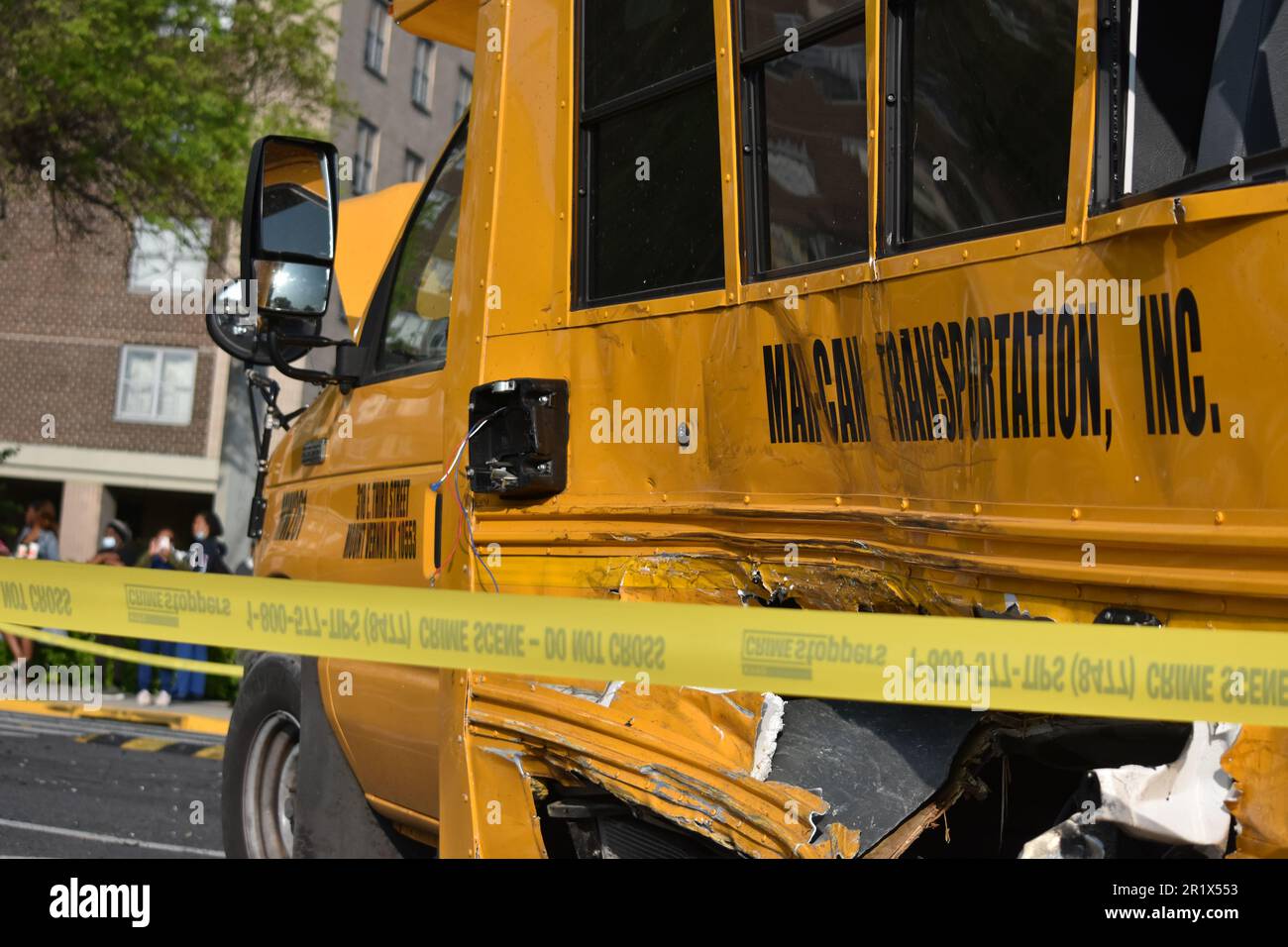 School bus involved in an accident left with a gaping hole and extreme ...
